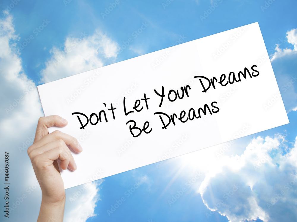 Don't Let Your Dreams Be Dreams Sign on white paper. Man Hand Holding Paper with text. Isolated ...