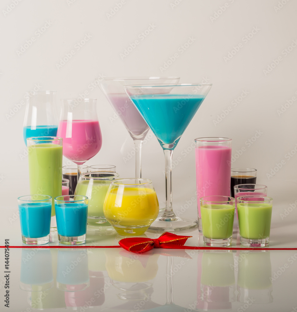 Colorful drinks based on milk liqueurs, unique pastel colors of drinks ...