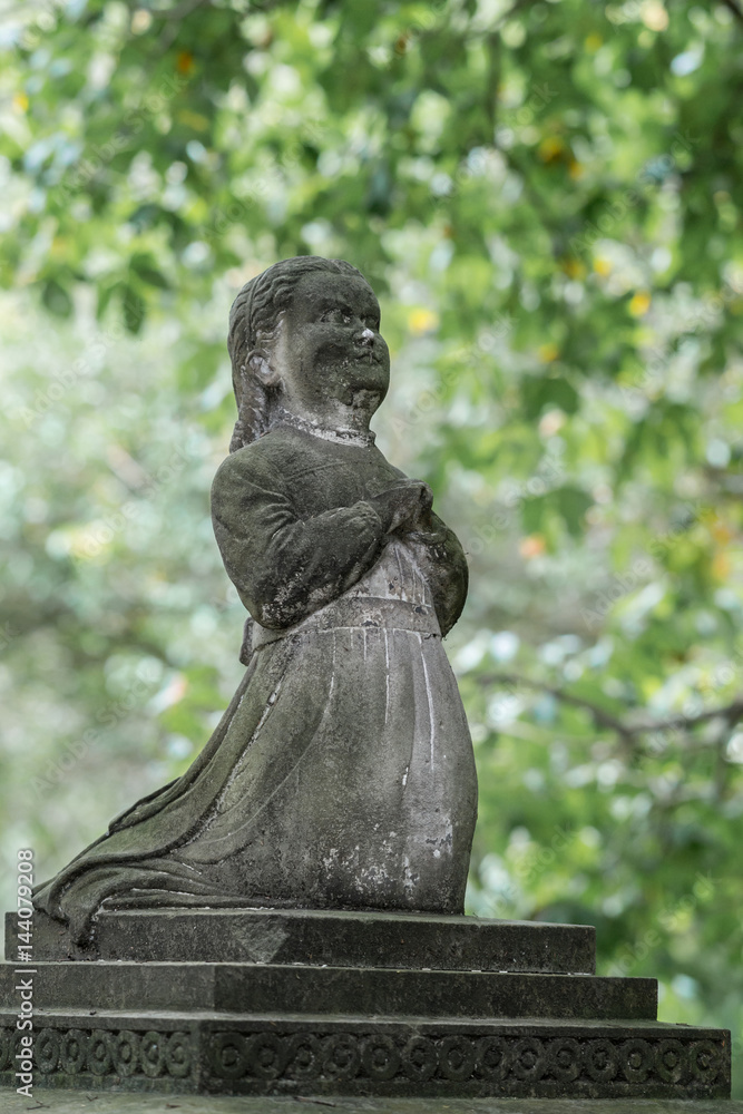 Auckland, New Zealand - March 1, 2017: Closeup of old stone statue ...