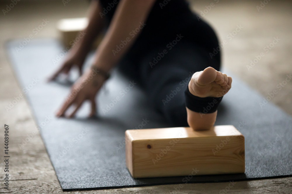 Young yogi woman practicing yoga concept, doing advanced splits ...