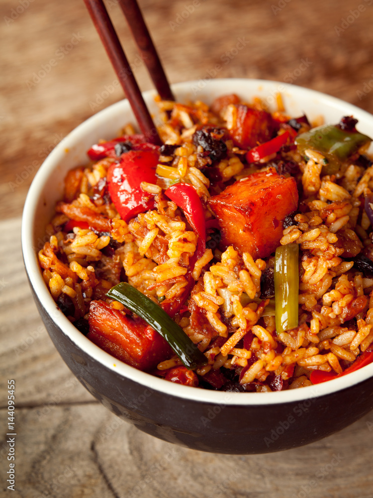 Foto Stock Chinese Spicy diced chicken rice | Adobe Stock