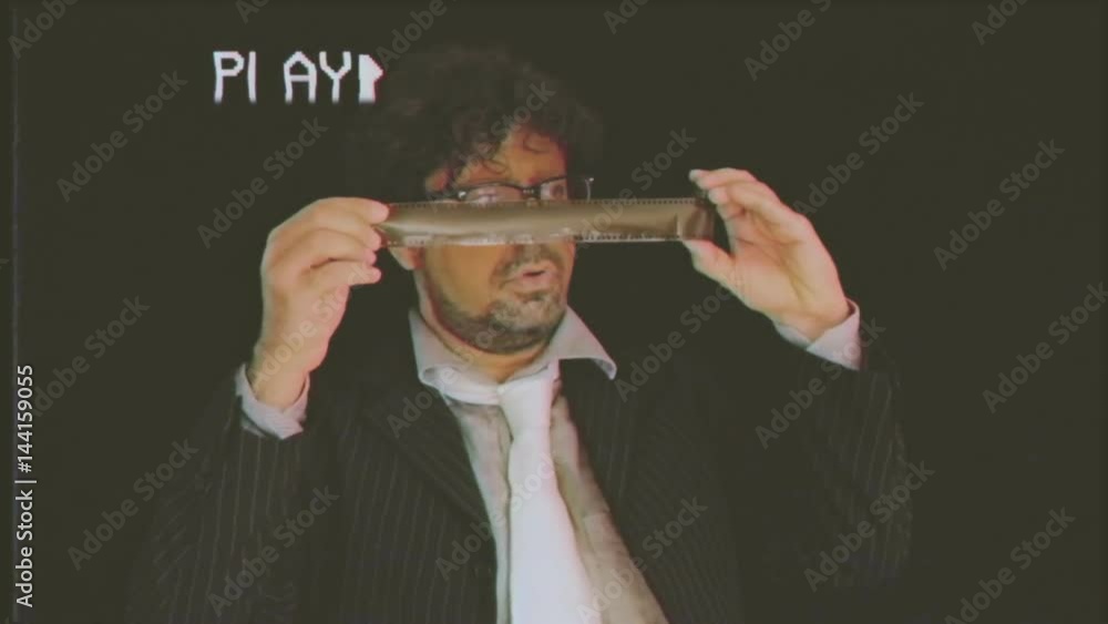 Fake VHS tape: an old man tries to understand what's on a film roll ...