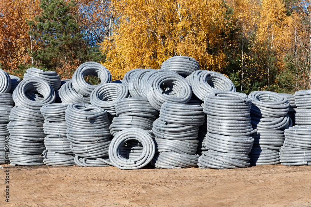 Stack of coiled plastic pvc Polyethylene Corrugated drainage pipes for ...