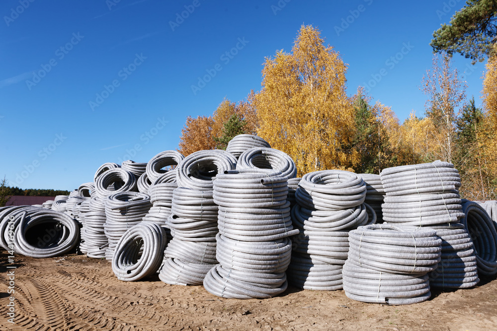 Stack of coiled plastic pvc Polyethylene Corrugated drainage pipes for ...
