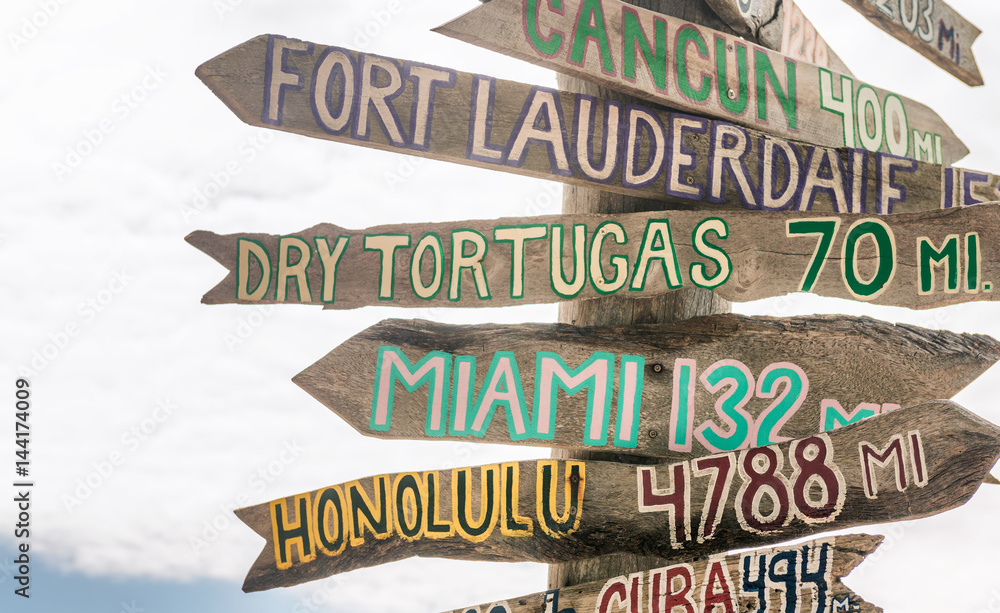 Key West beach distance signs to worldwide landmarks in Fort Zachary ...