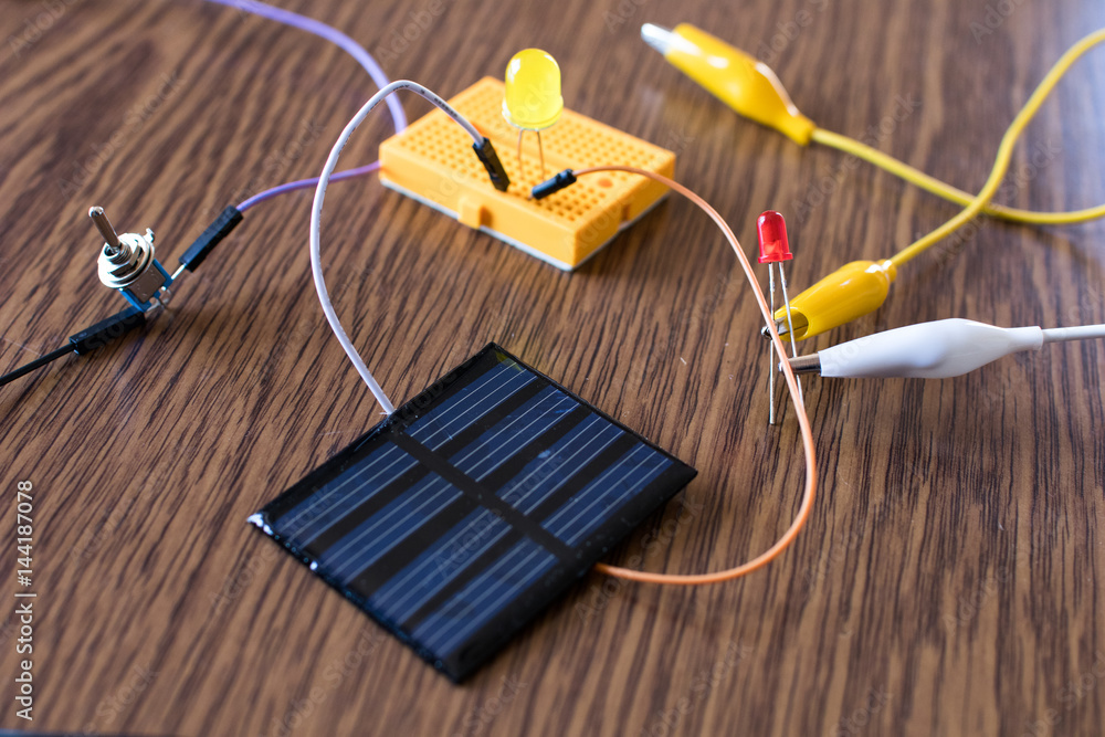 Solar panel, led, breadboard, switch, alligator clip wire together for ...
