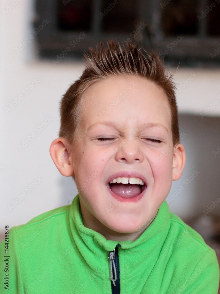 Smiling beautiful boy close-up face portrait in blue shirt. Stock Photo ...