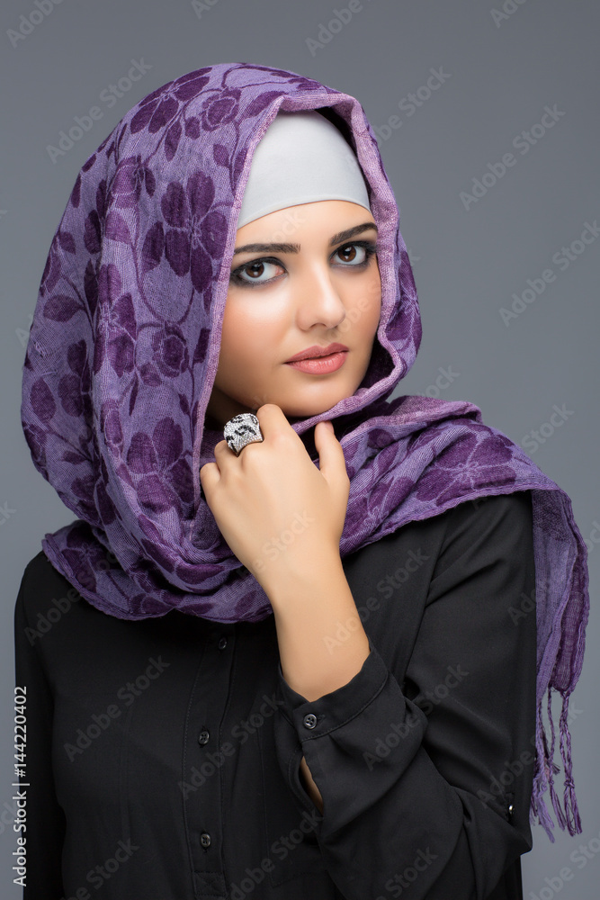 Woman in a Muslim headscarf hijab Stock Photo | Adobe Stock