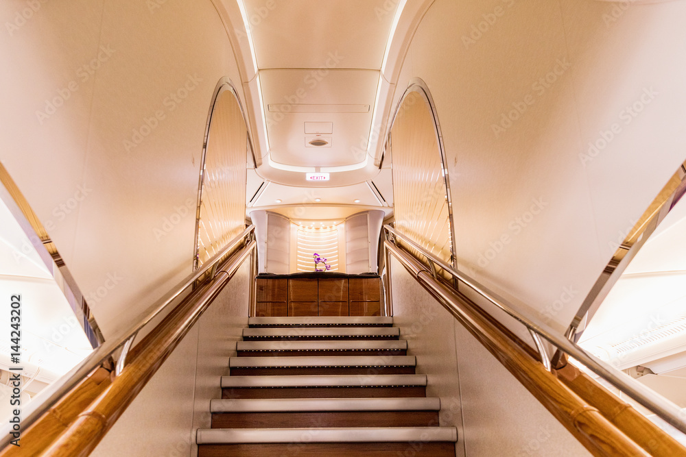 Interior of a modern aircraft stairs to the upper deck of a luxury ...