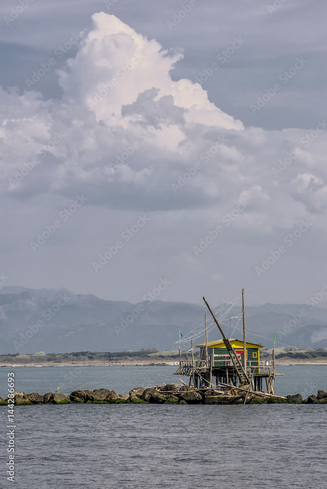 Drop net fishing from one of the famous trebuchets in Marina di Pisa ...
