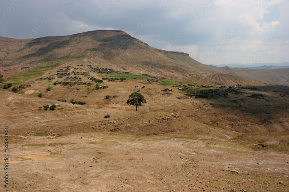 Typical local village in rural between Makunyapane and Linakeng ...