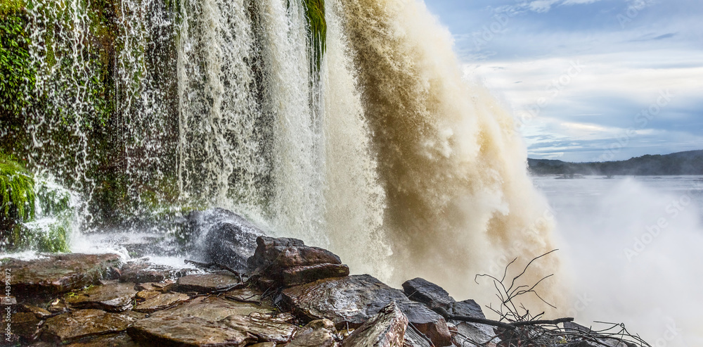 Side view of the Hacha falls in the lagoon of Canaima national park ...