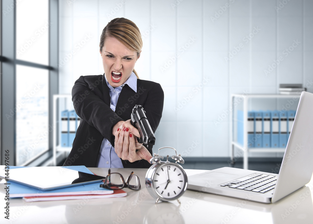 business woman furious and angry working with computer laptop pointing ...