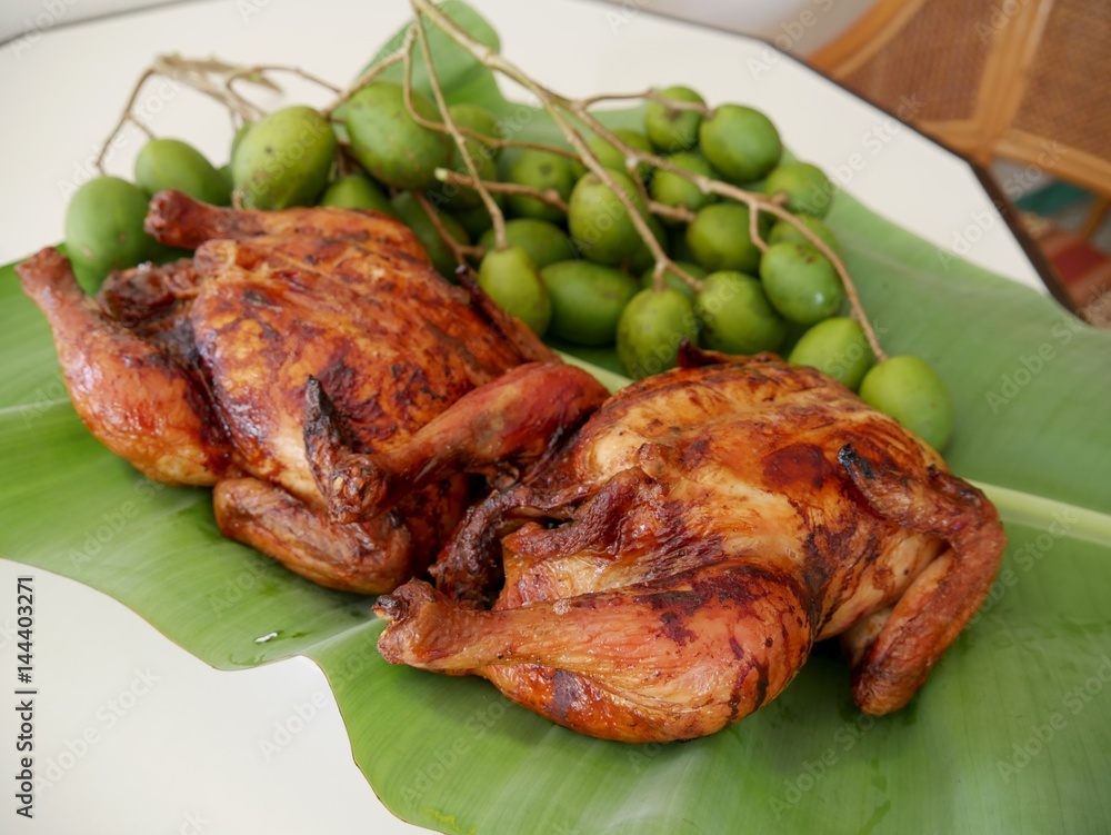 Roasted chicken (lechon manok) and green mangoes “lechon manok” or ...