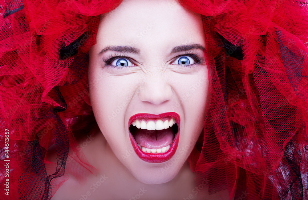 Portrait of beautiful woman. Aggressive face. Fashion photo Stock Photo ...