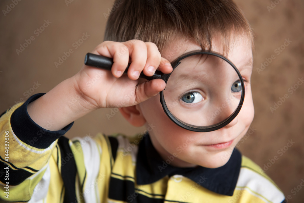 Kid Looking Through Magnifying Glass