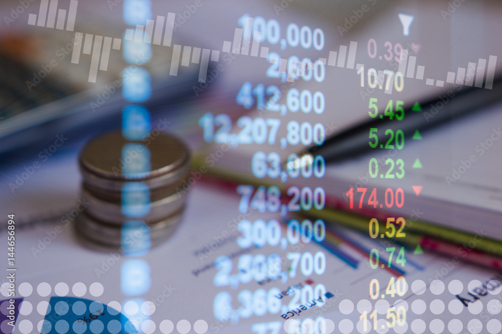 Profit graph of stock market indicator whit coin pen and notebook blur ...