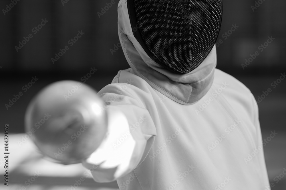 the fencer prepares for competitions. fencing coach. fencing sport ...