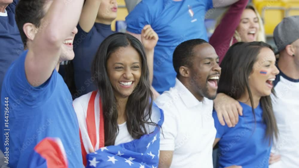 Excited sports crowd with national flags cheering on their teams Stock ...