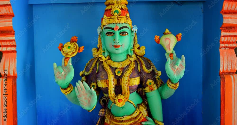 Statue of Blue Skinned Deity with Four Hands in Hindu Temple vídeo de ...