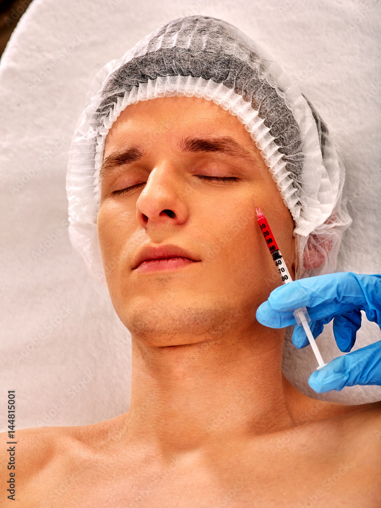 Filler injection for male face. Plastic aesthetic facial surgery in ...