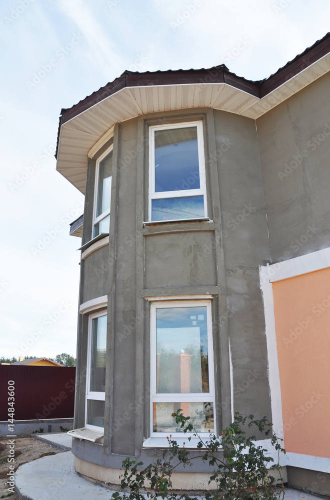 Unfinished house with plastering wall and stucco wall after mineral ...