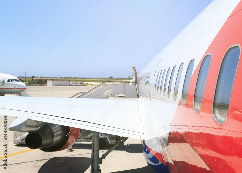 large heavy modern passenger widebody airplane side close up detailed ...