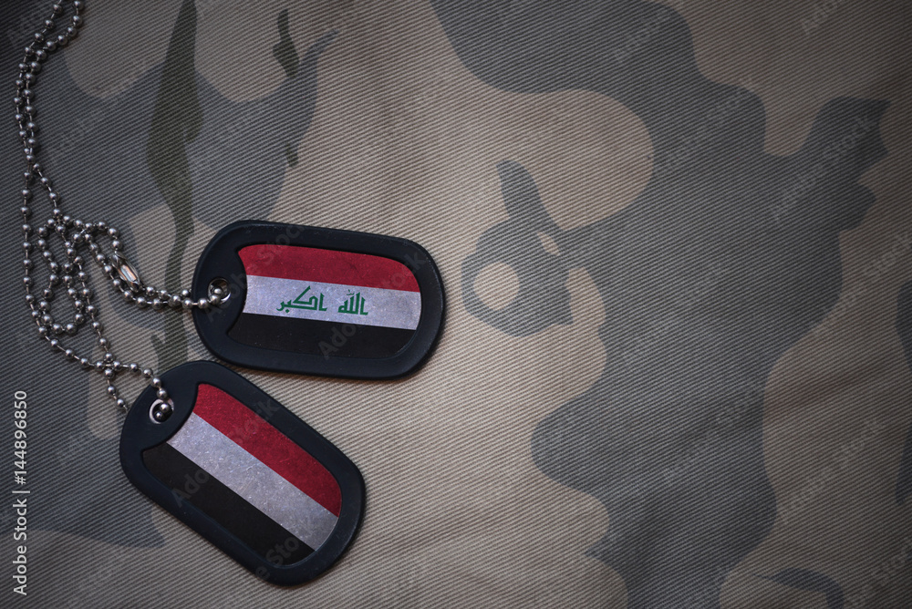 army blank, dog tag with flag of iraq and yemen on the khaki texture ...