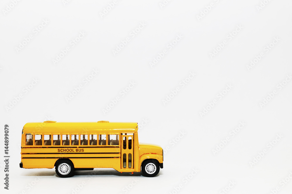 Yellow school bus kids toy on white background Stock Photo | Adobe Stock
