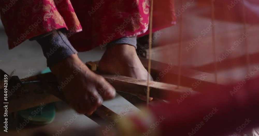 Nepali women makes a Pashmina Shawl the traditional way in Bhaktapur ...