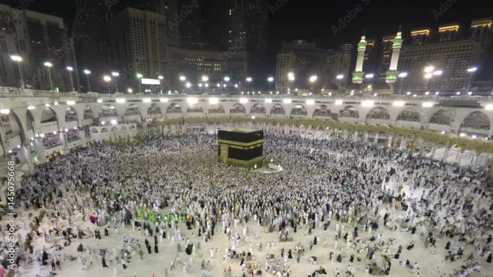 Time lapse video of Muslim pilgrims circling around the holy Kaaba at ...