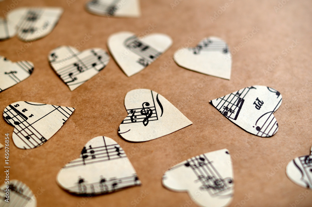 Paper hearts with music notes on craft paper background Stock Photo ...
