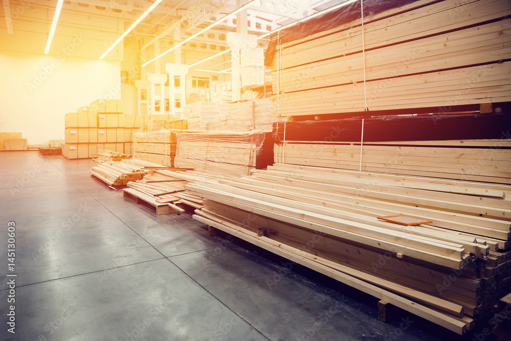 sawn wood. Shelf with structural materials on the shelves in the ...