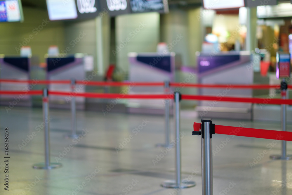 Stanchion barriers for waining lines in front of check in desks in ...