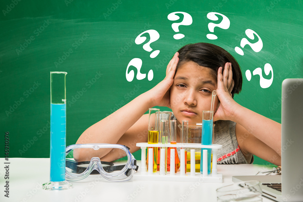 Kids and Science concept - Cute Indian little girl worried or confused ...