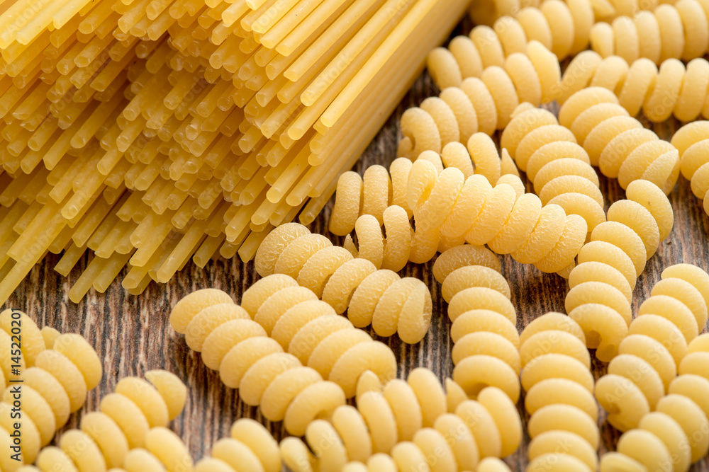 Variety of types and shapes of dry Italian pasta. Italian Macaroni raw ...