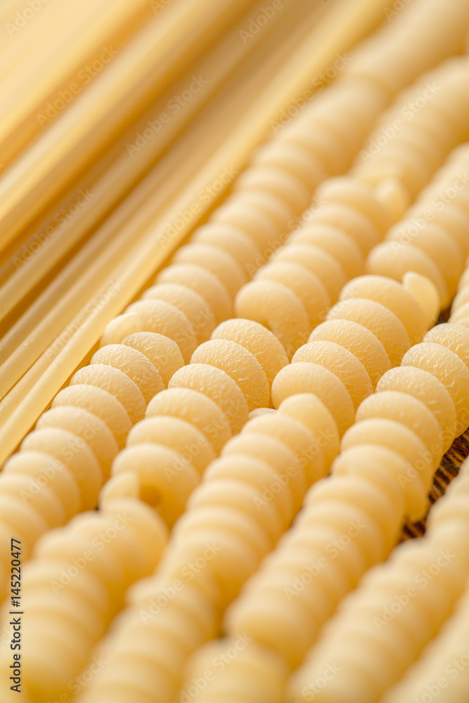 Variety of types and shapes of dry Italian pasta. Italian Macaroni raw ...