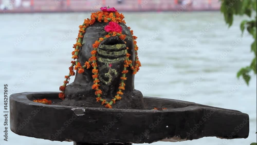 A close up shot of a Shiva-lingam, the generative symbol of the Hindu ...