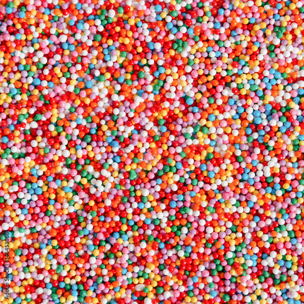 Colorful sweet background with sprinkles. Holiday treat. Cupcake and ...