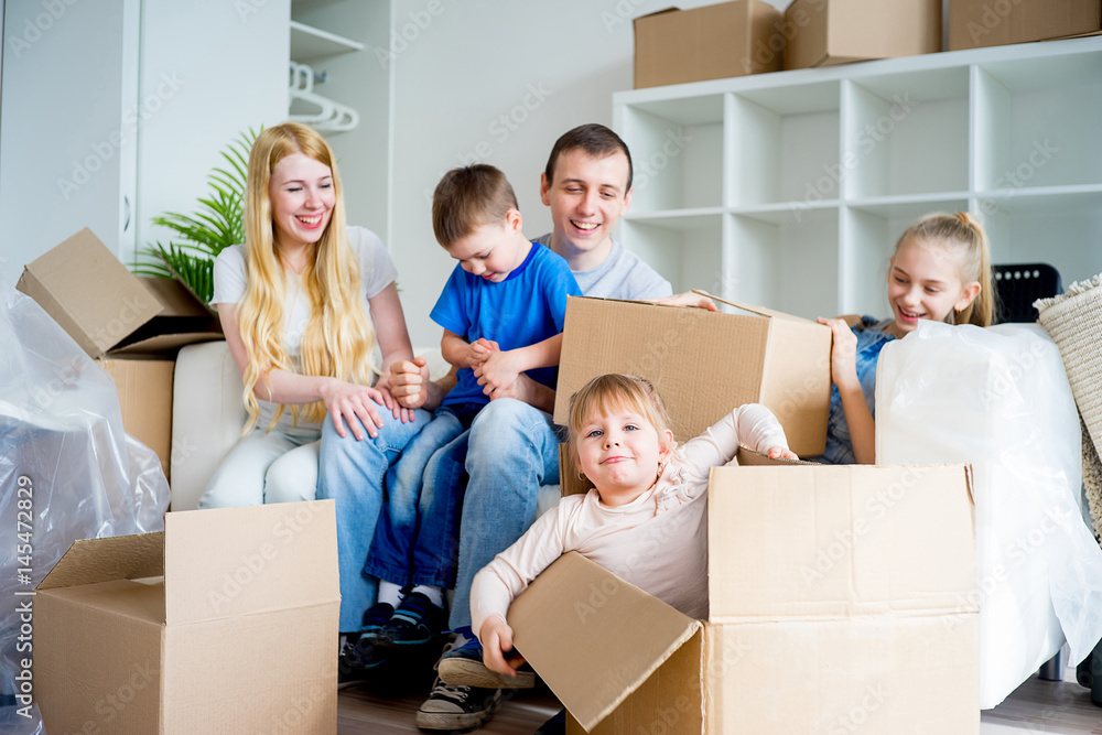 Family moving to a new home Stock Photo | Adobe Stock