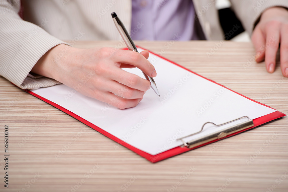 Hands taking notes in the pad Stock Photo | Adobe Stock