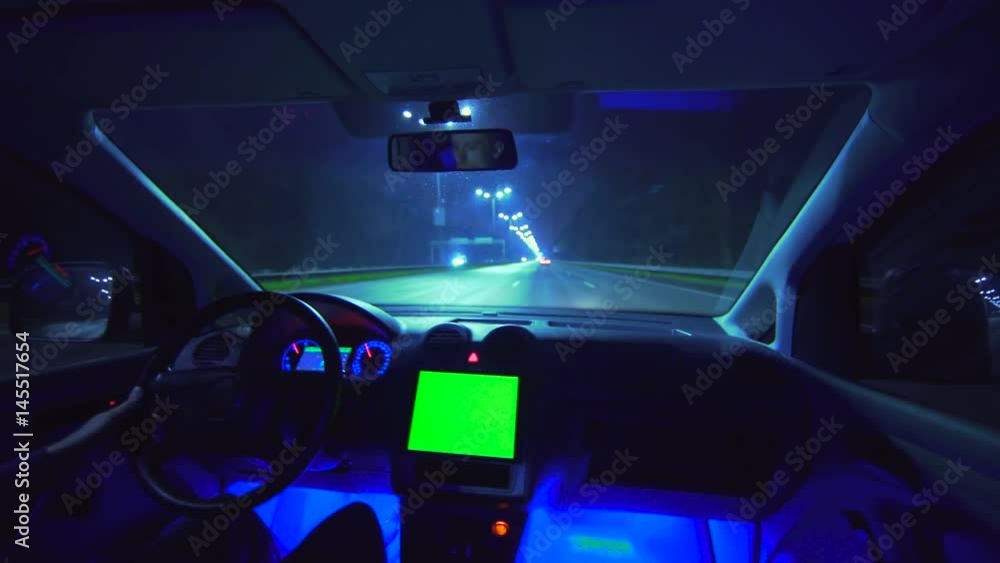 Vídeo do Stock: The man drive a car on the night autobahn. inside view ...