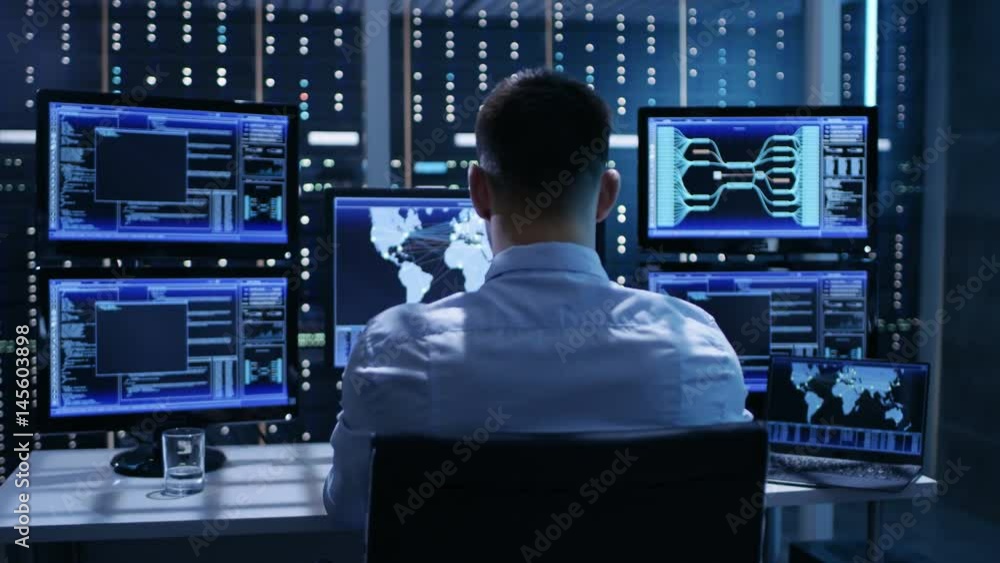 Vídeo do Stock: Technical Controller Working at His Workstation with ...