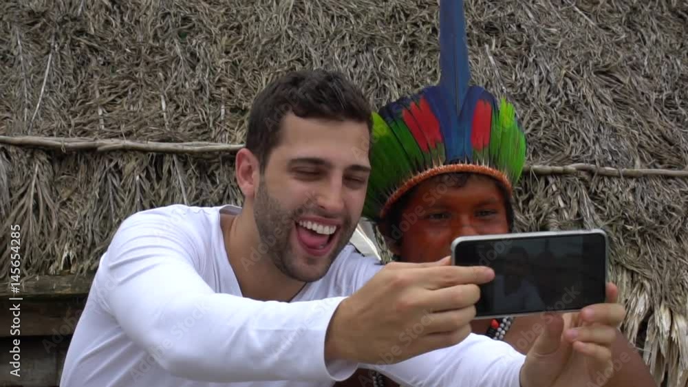 Tourist taking a selfie with a Brazilian Native - Indigenous Man - in a ...