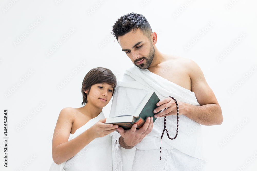 Muslim man posing as ready for Hajj visiting Kaaba in Mecca Stock Photo ...