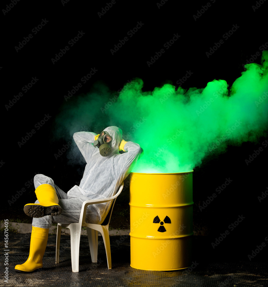 biohazard worker and radioactive green smoke coming out from yellow ...