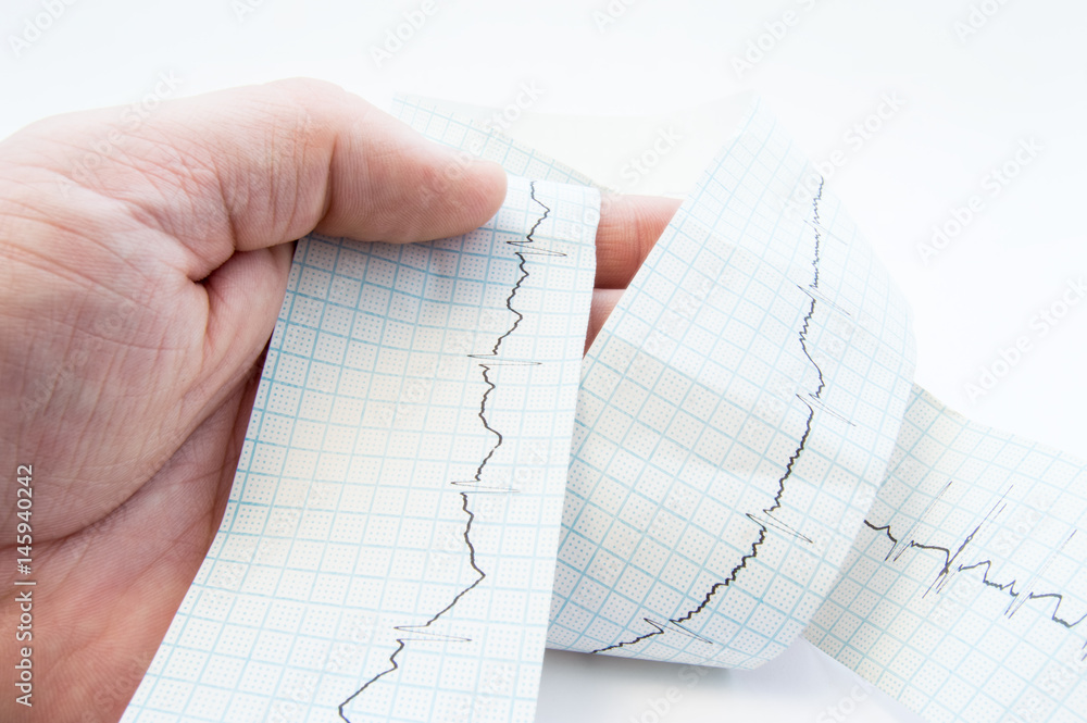 General practitioner, cardiologist or paramedic holding in hand tape ...