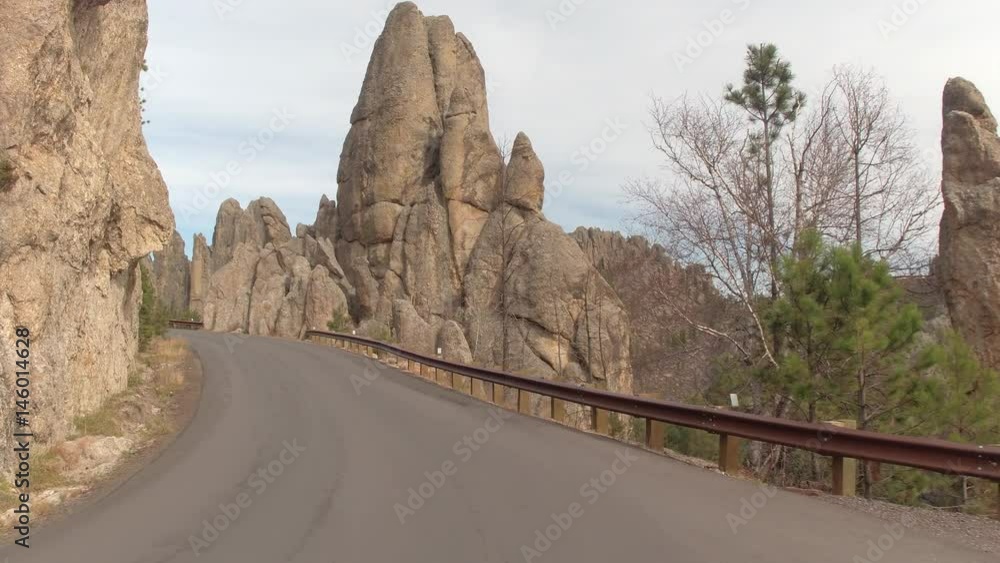 FPV, CLOSE UP: Driving on scenic steep curvy mountain pass road on ...