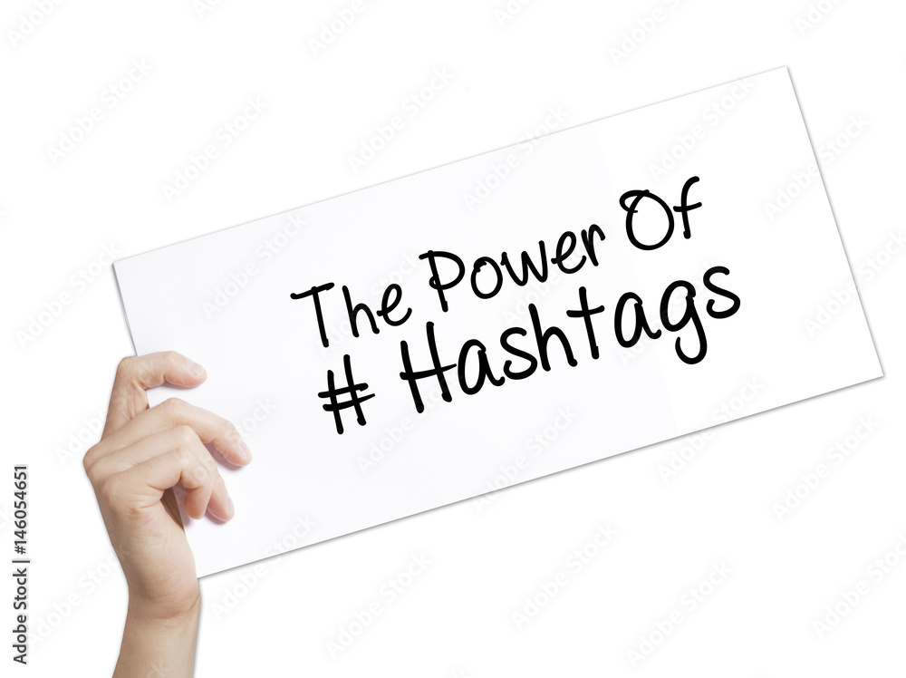 The Power of Hashtags Sign on white paper. Man Hand Holding Paper with ...