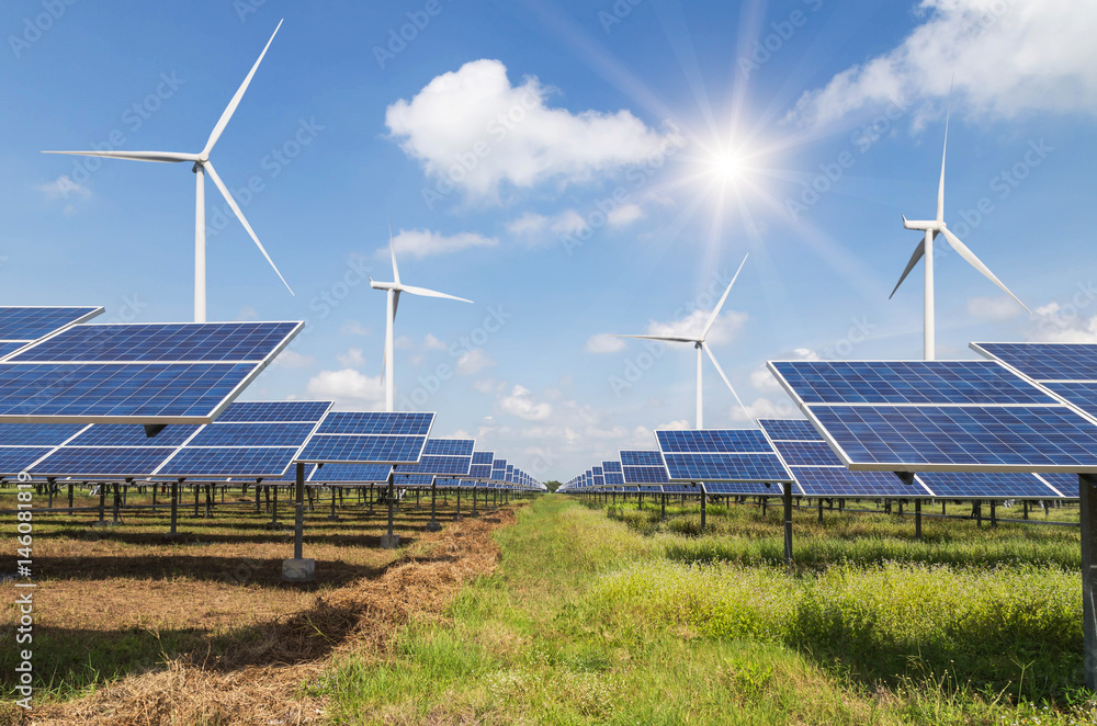solar panels and wind turbines generating electricity in power station ...